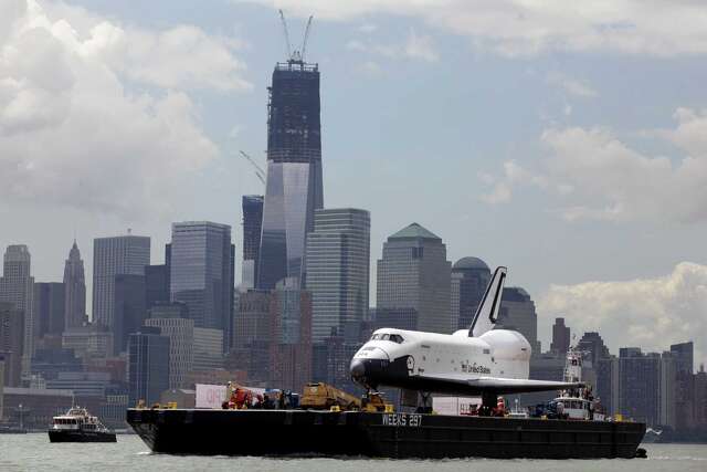 News of the world in photos: Space shuttle comes home