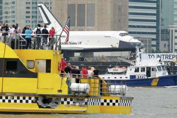 News of the world in photos: Space shuttle comes home
