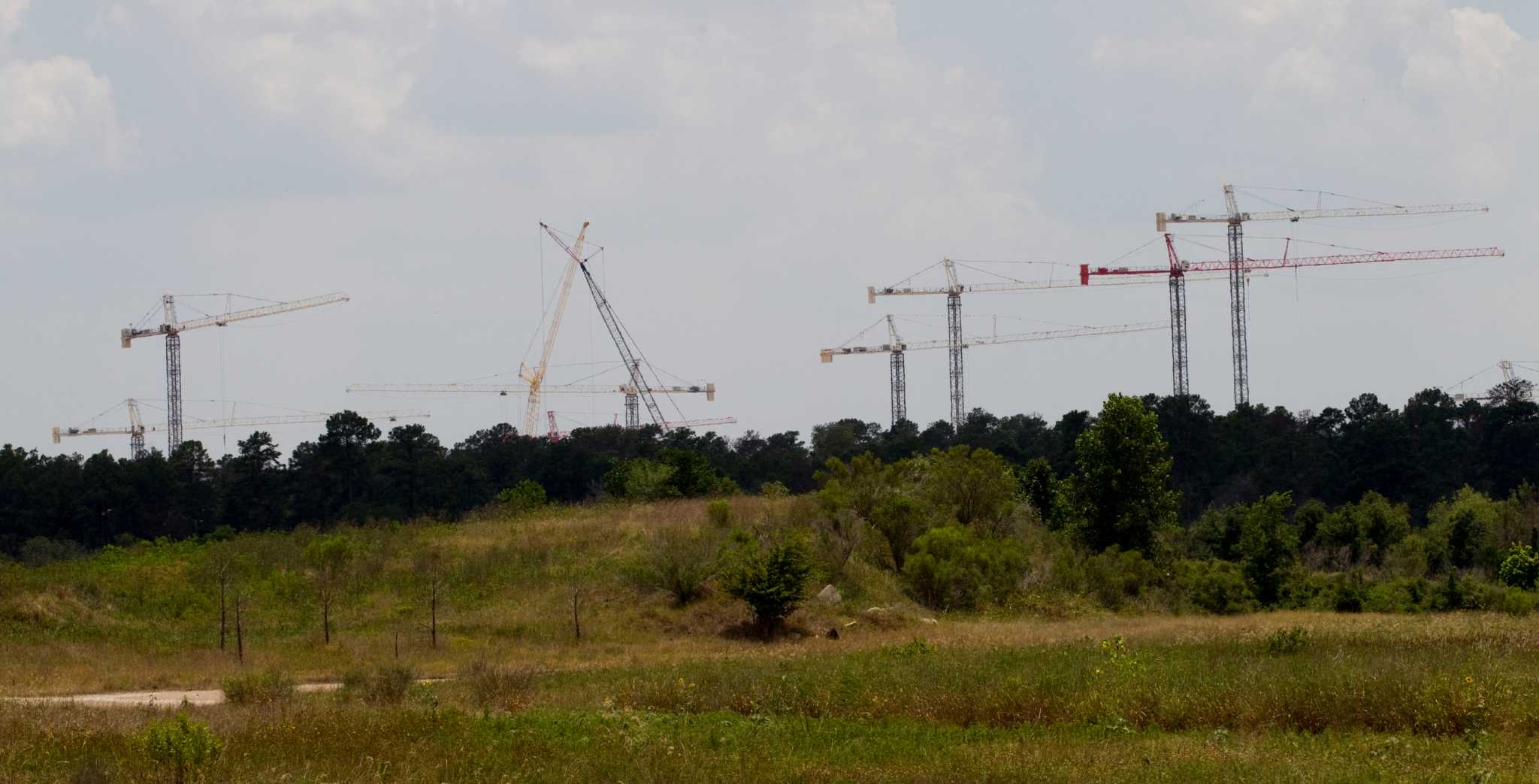 Exxon's impact north of Houston expands