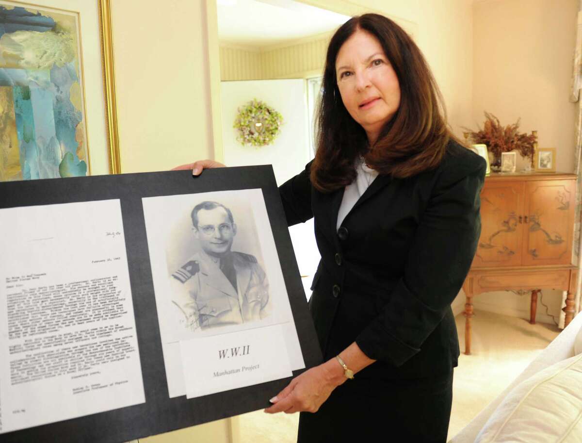 Greenwich woman helping father get recognition