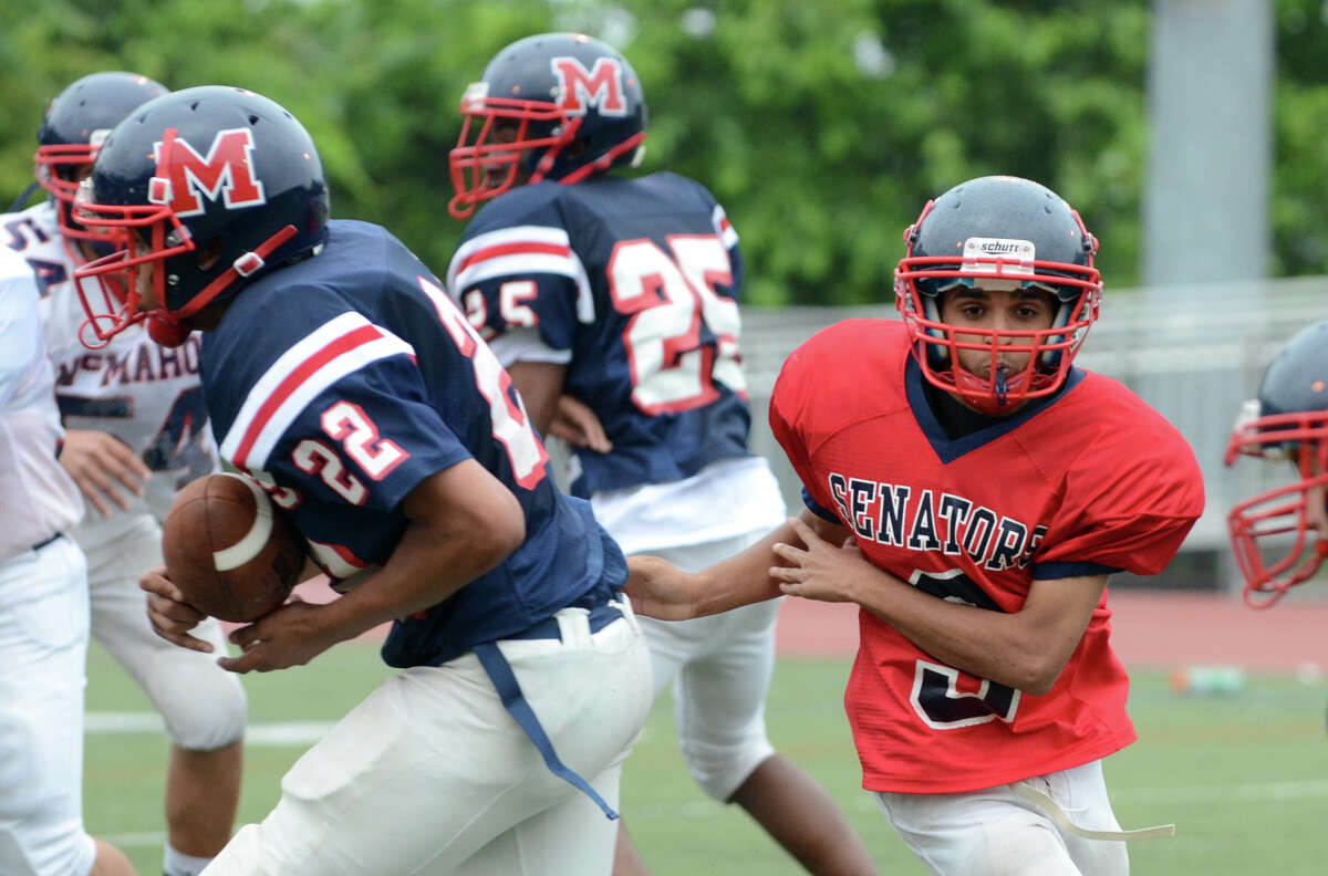 McMahon football leaning on its seniors in spring workouts