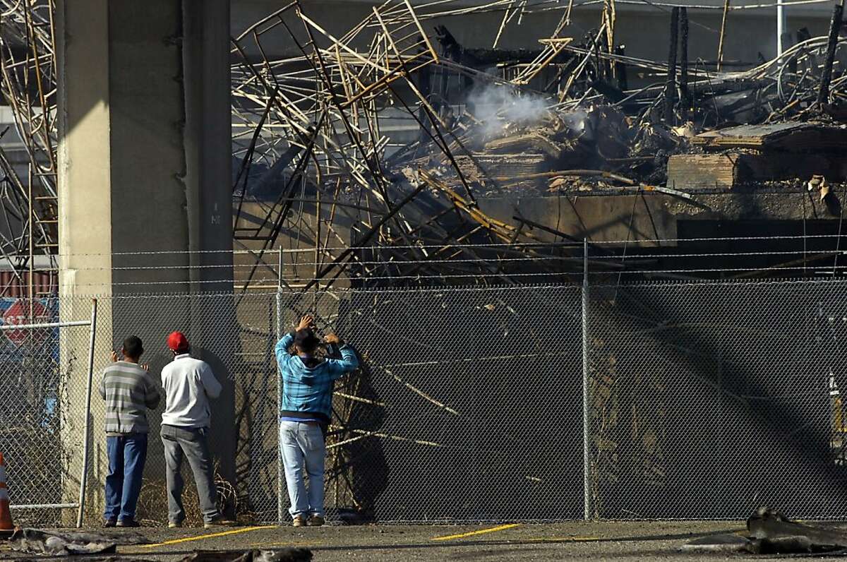 Investigators probe fire; BART back to normal