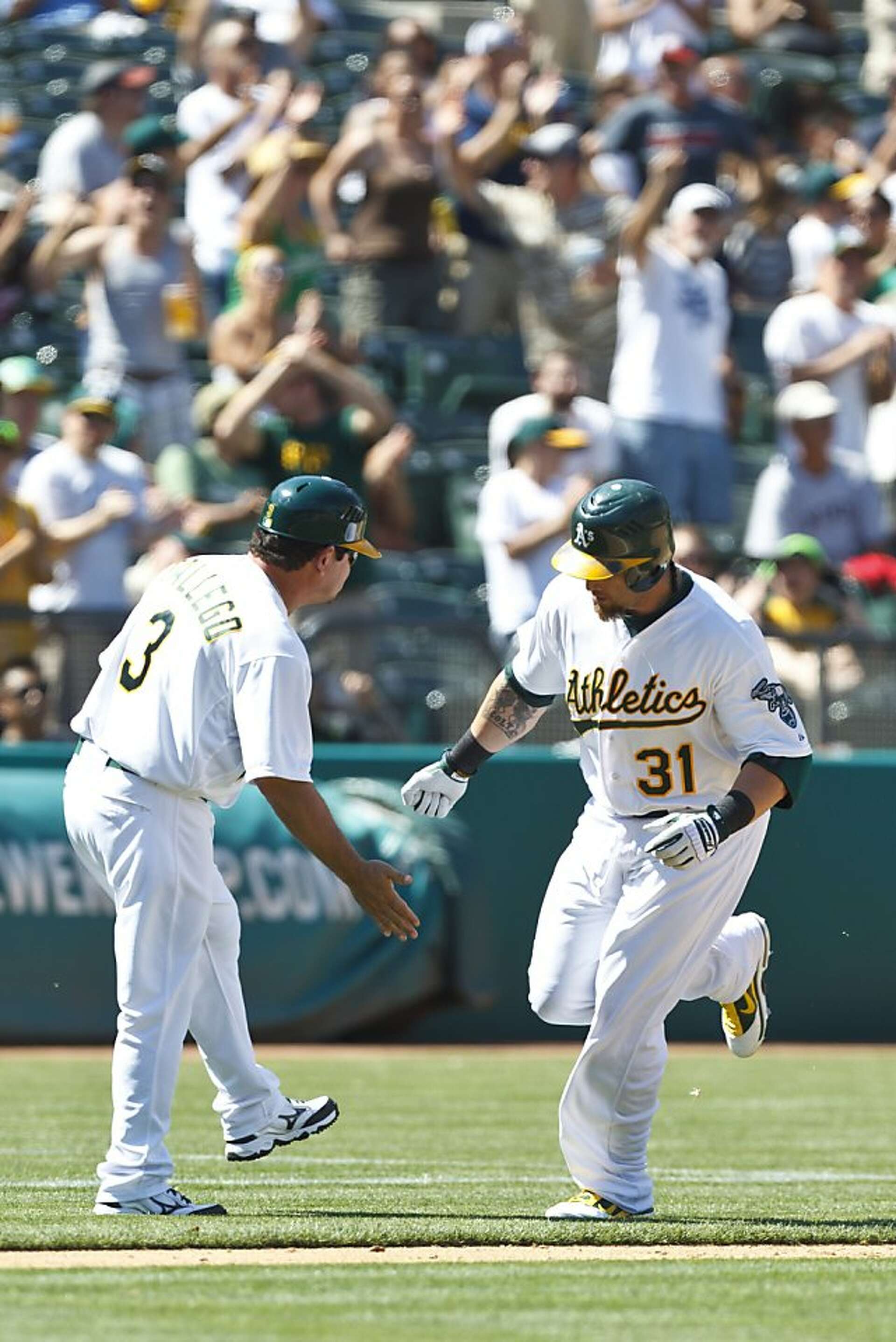 A's muscle up for season-high 5th straight win