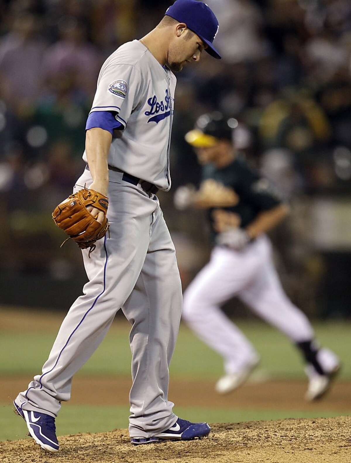 Home, sweet Milone completely dominant in Oakland