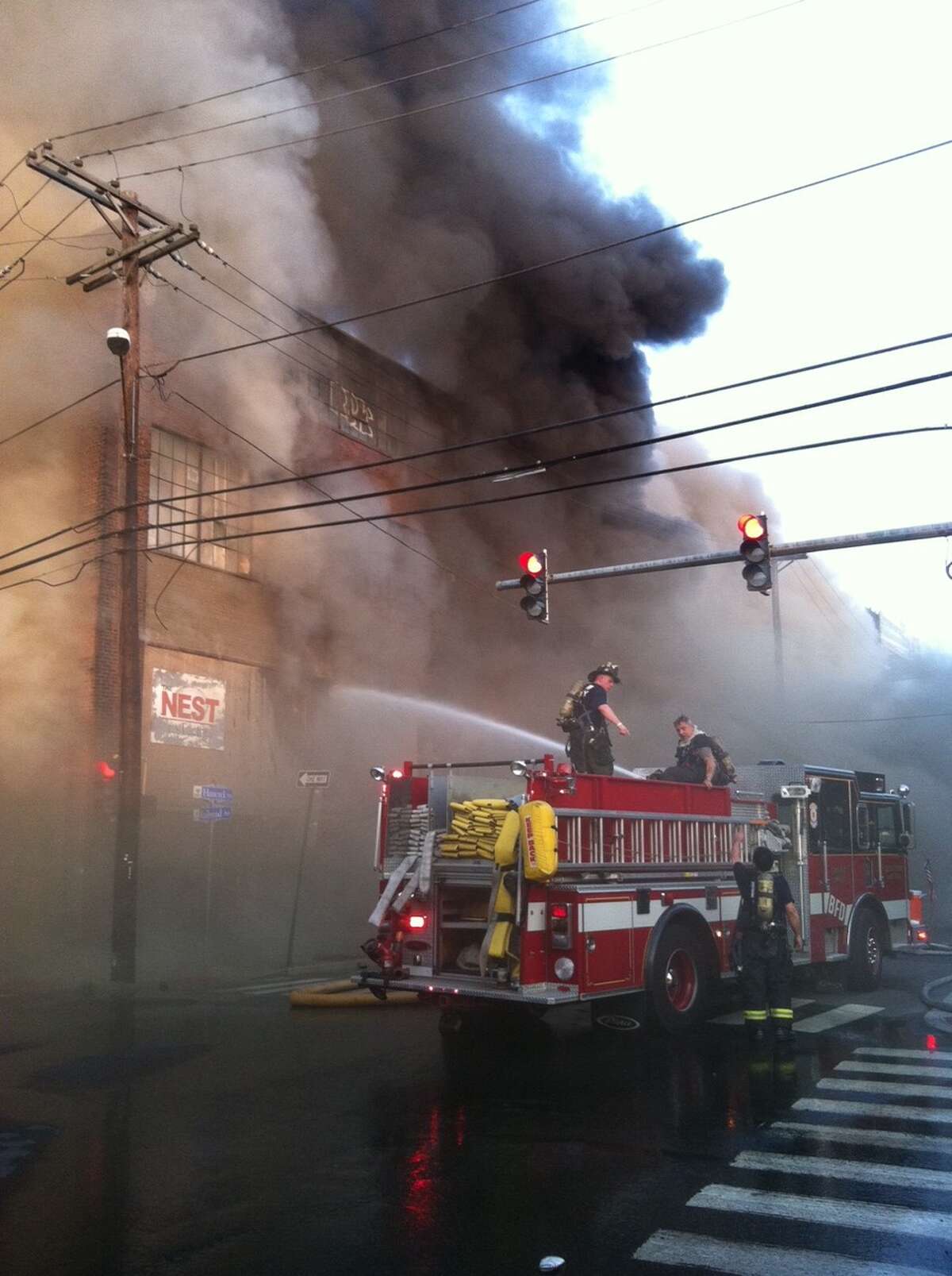 Vacant factory still burning Friday night