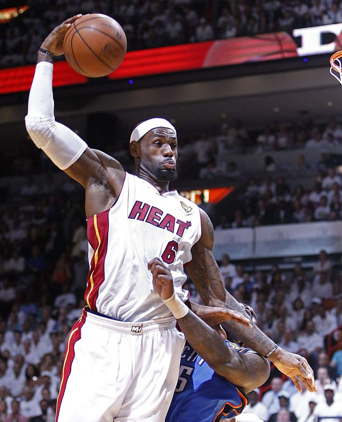 LeBron's triple-double caps Heat's title run