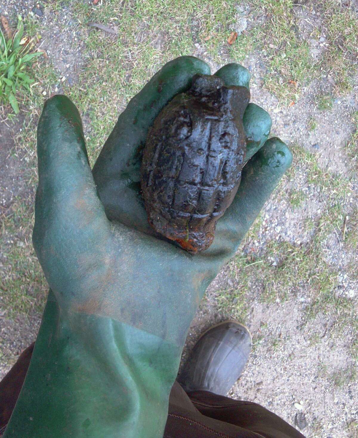 Volunteers find grenade in Mill River