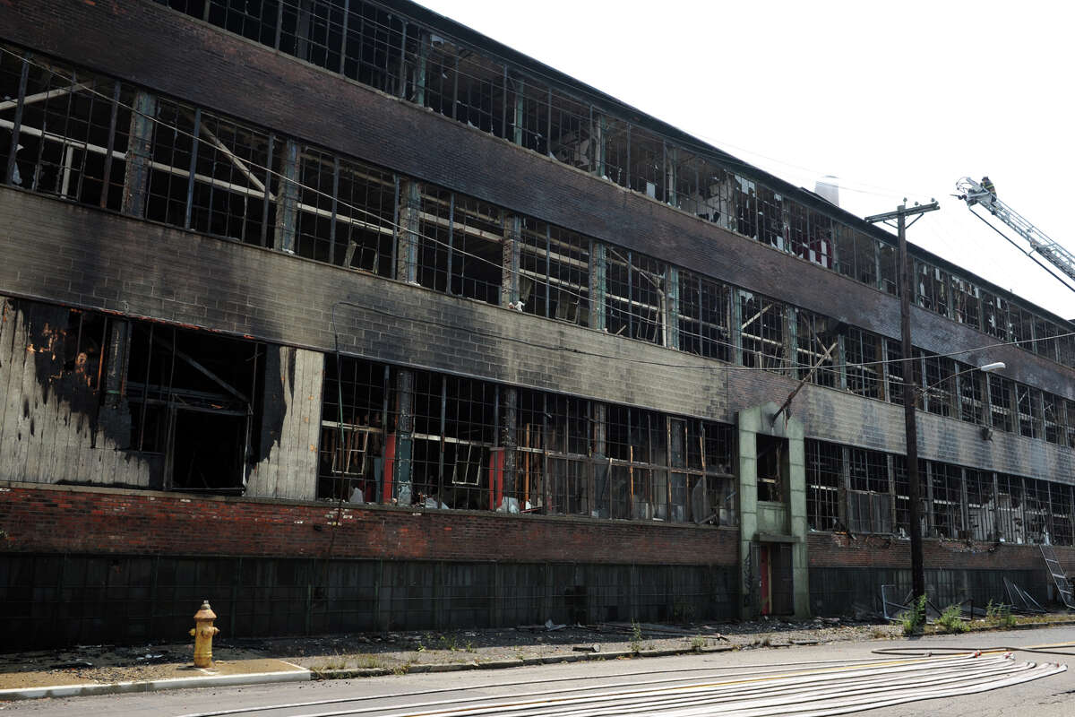 Vacant factory still burning Friday night