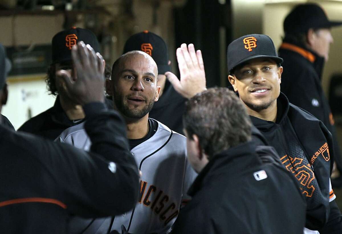 Brandon Belt keys SF Giants' rally past A's in 9th