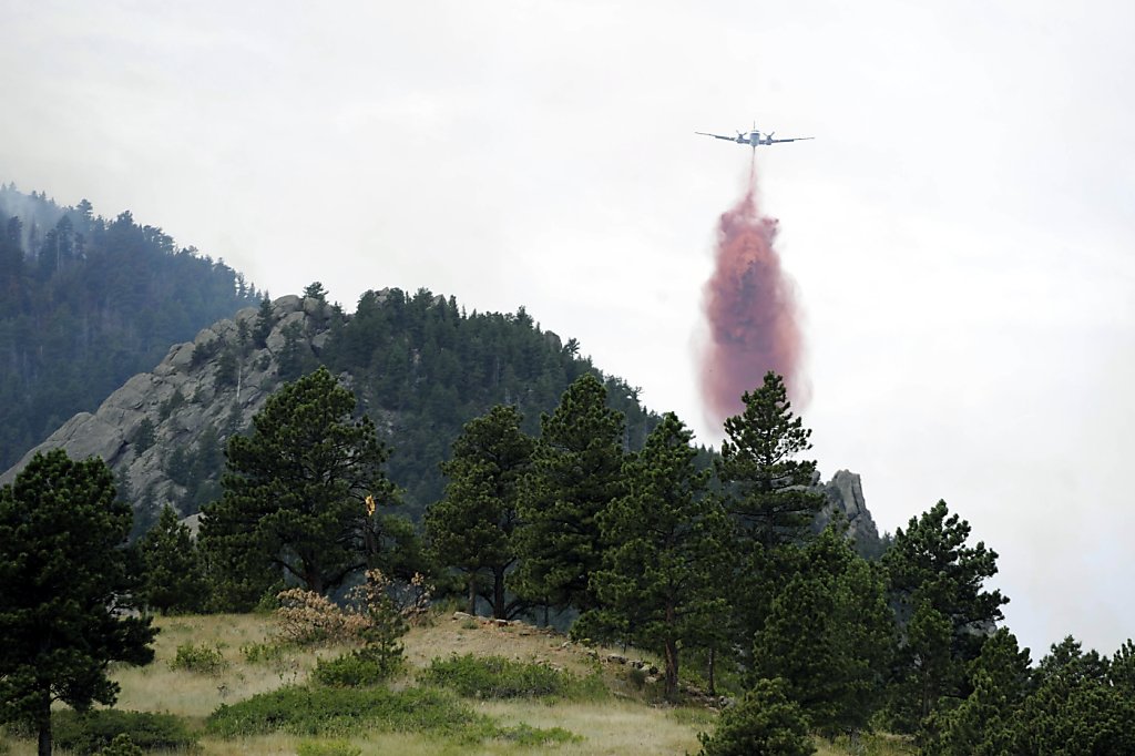 Wildfires in the West continue destruction