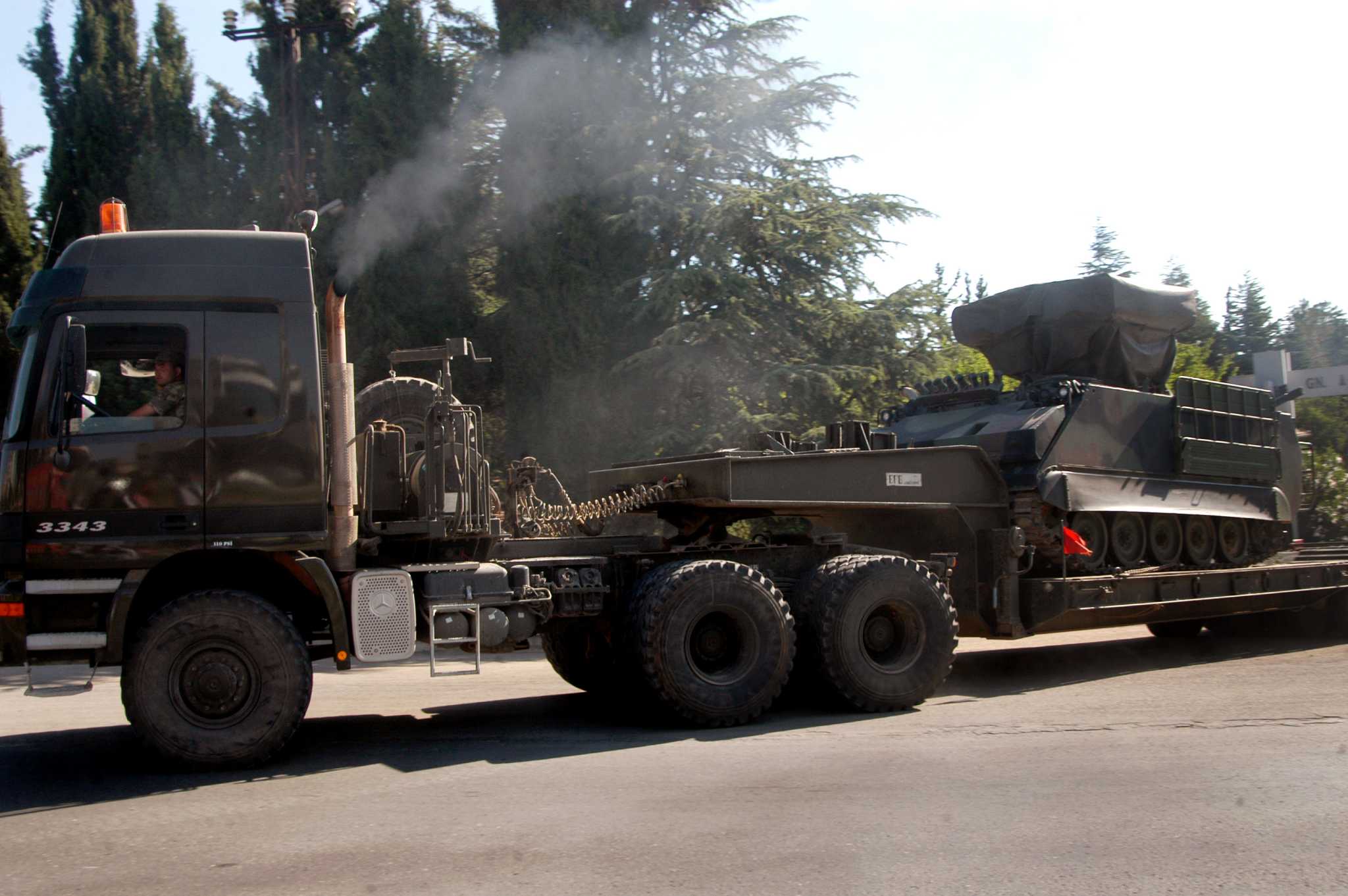 Turkey fortifies Syrian border; bomb hits Damascus