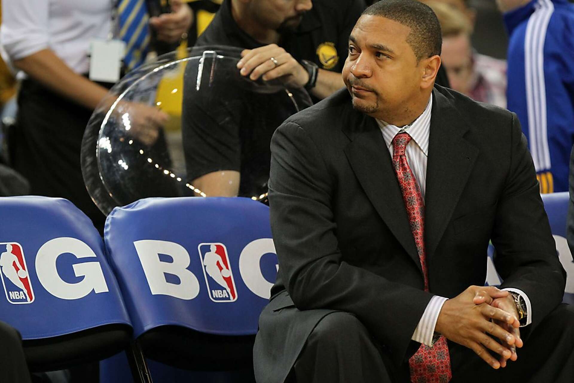 Woman, man charged in Mark Jackson extortion case