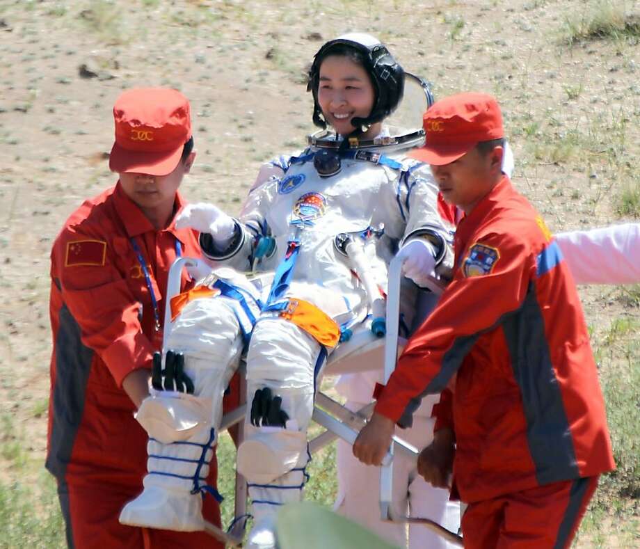 1st Chinese female astronaut, crew land safely - SFGate