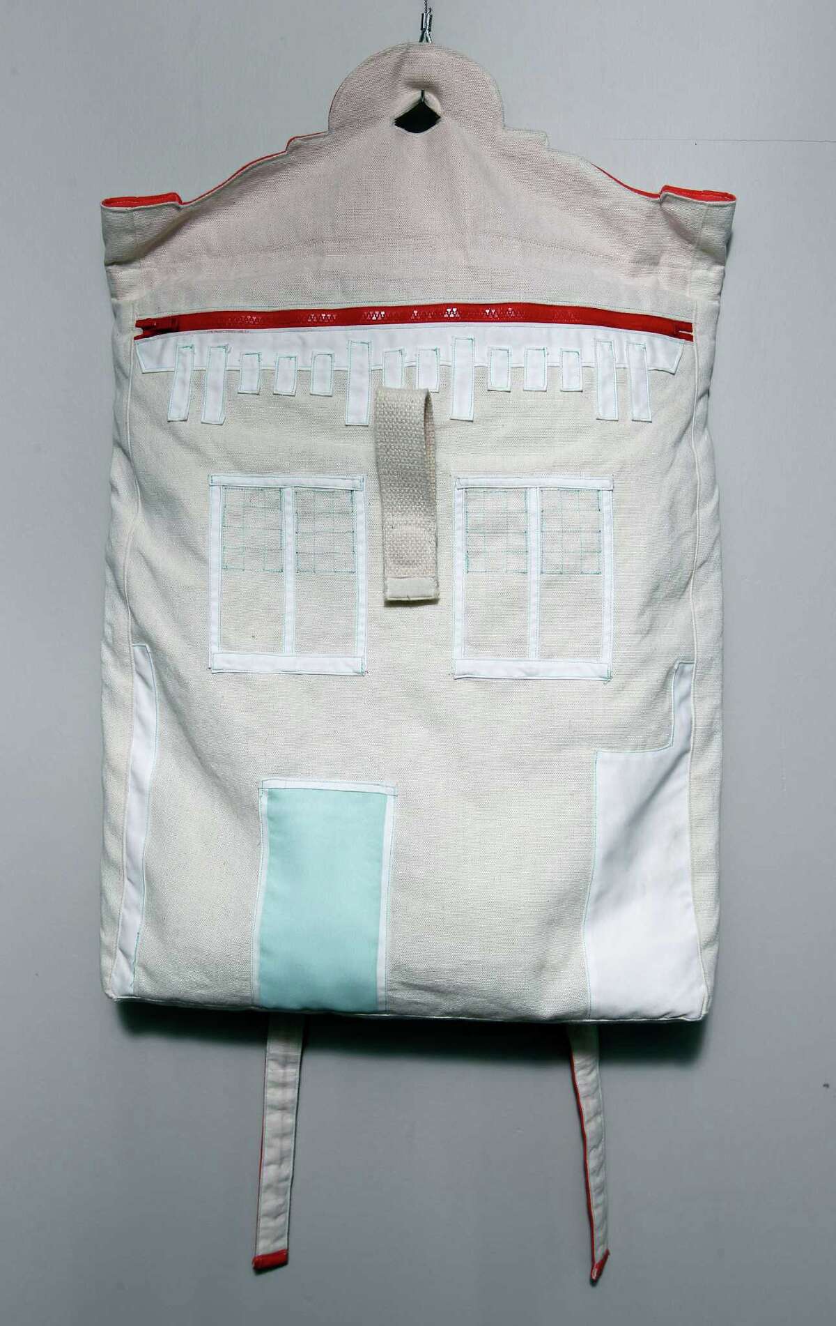 Artist re-creates buildings as backpacks