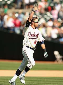 A's top Mariners 2-1 to head into break at .500