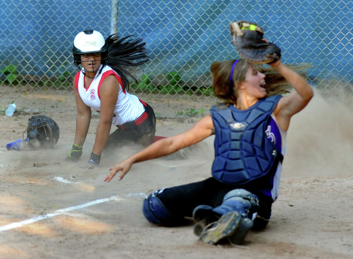 Softball Catchers In Action