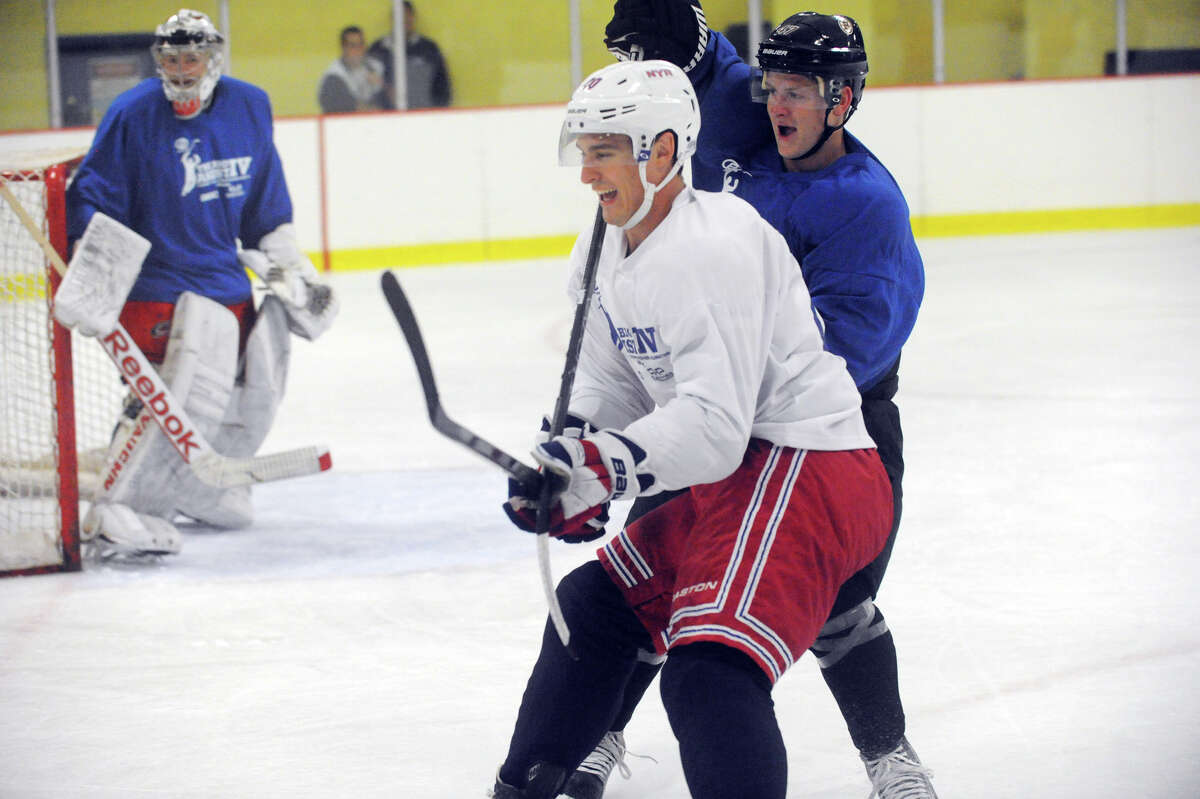 Big Assist IV hockey benefit game a rousing success