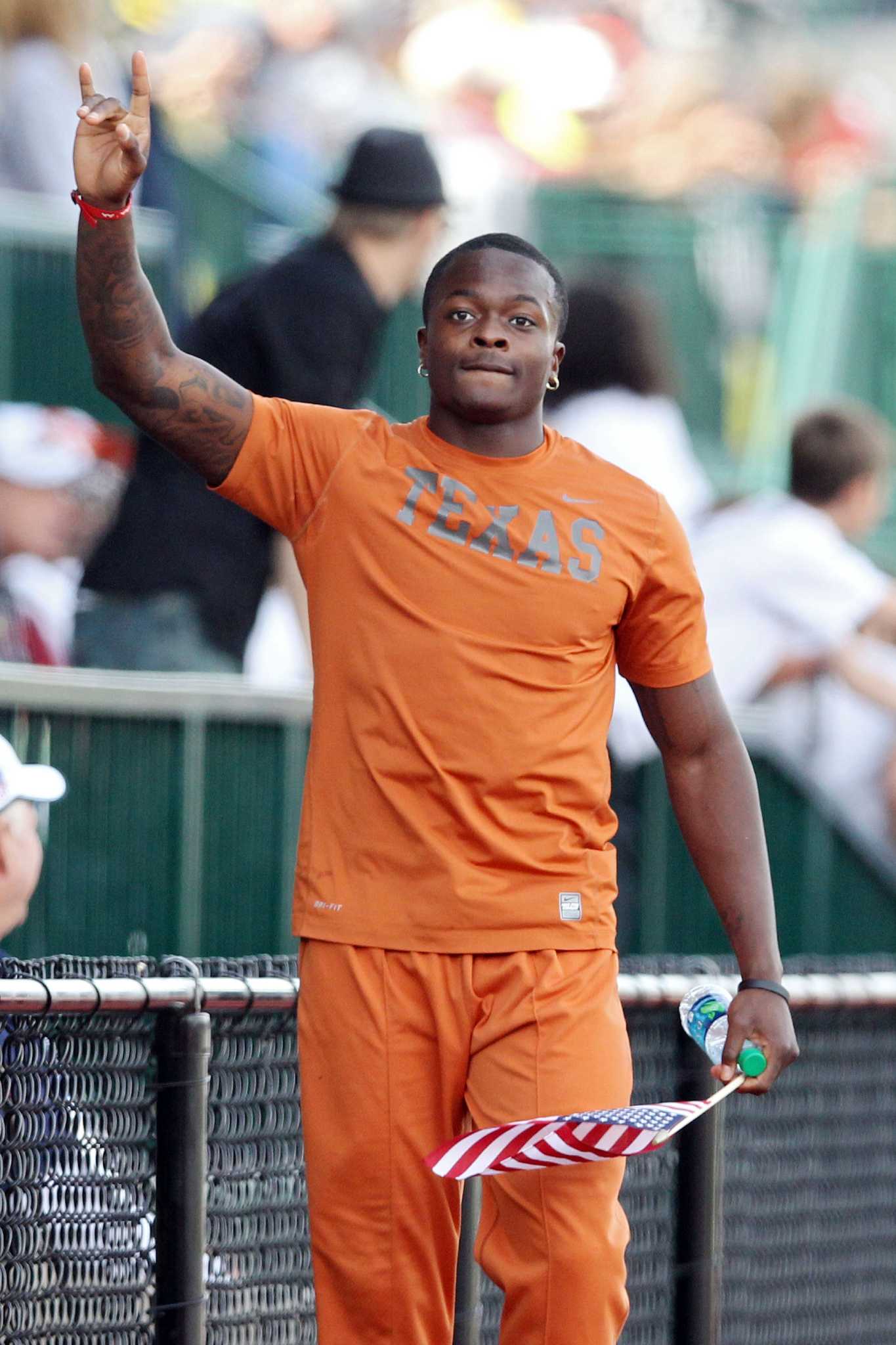 Goodwin's double duty big leap for Longhorns