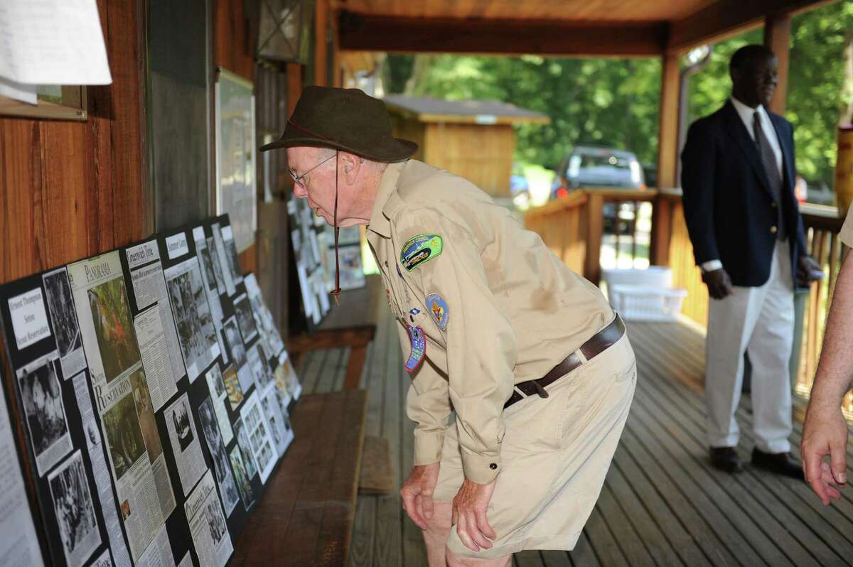 Boy Scouts blow out birthday candles