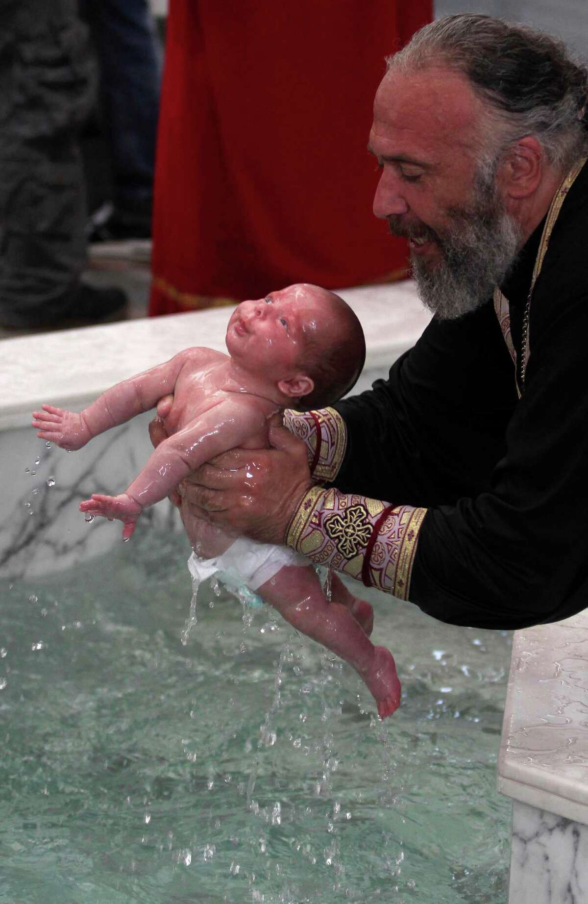 Baptism rates slide despite high-profile boosts Baptism rates slide despite high-profile boosts