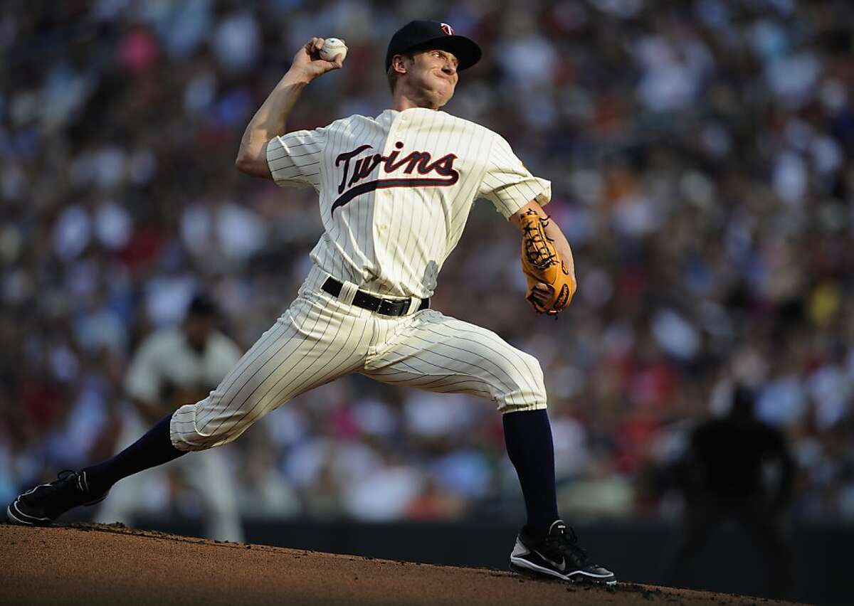 A's hit 4 homers, crush Twins 9-3