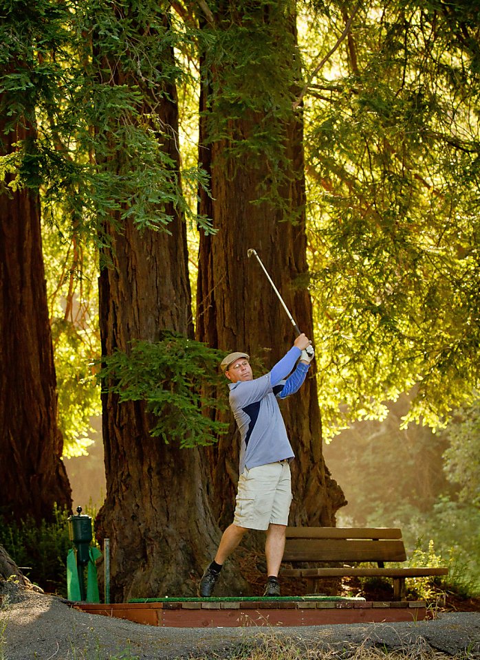 Early golfer has dewy course to himself