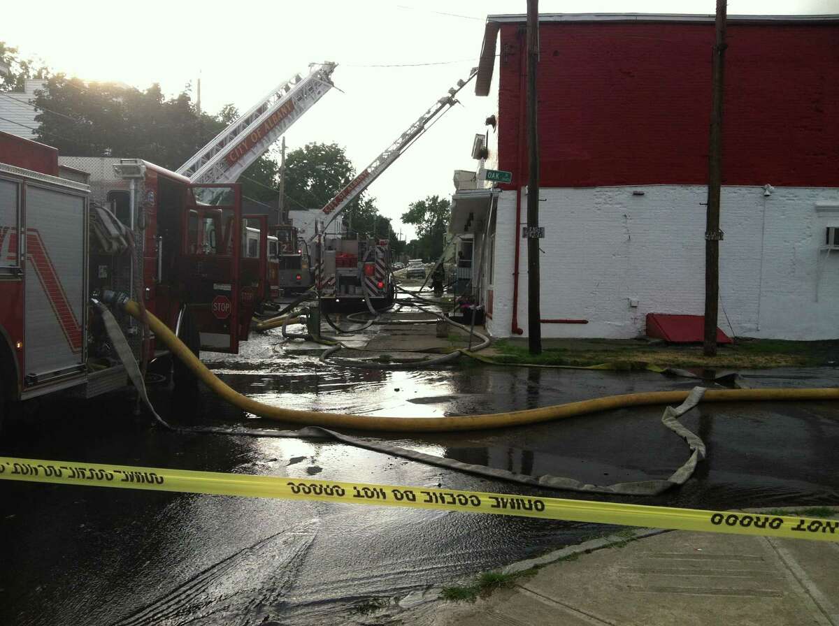 Auto repair shop fire spreads