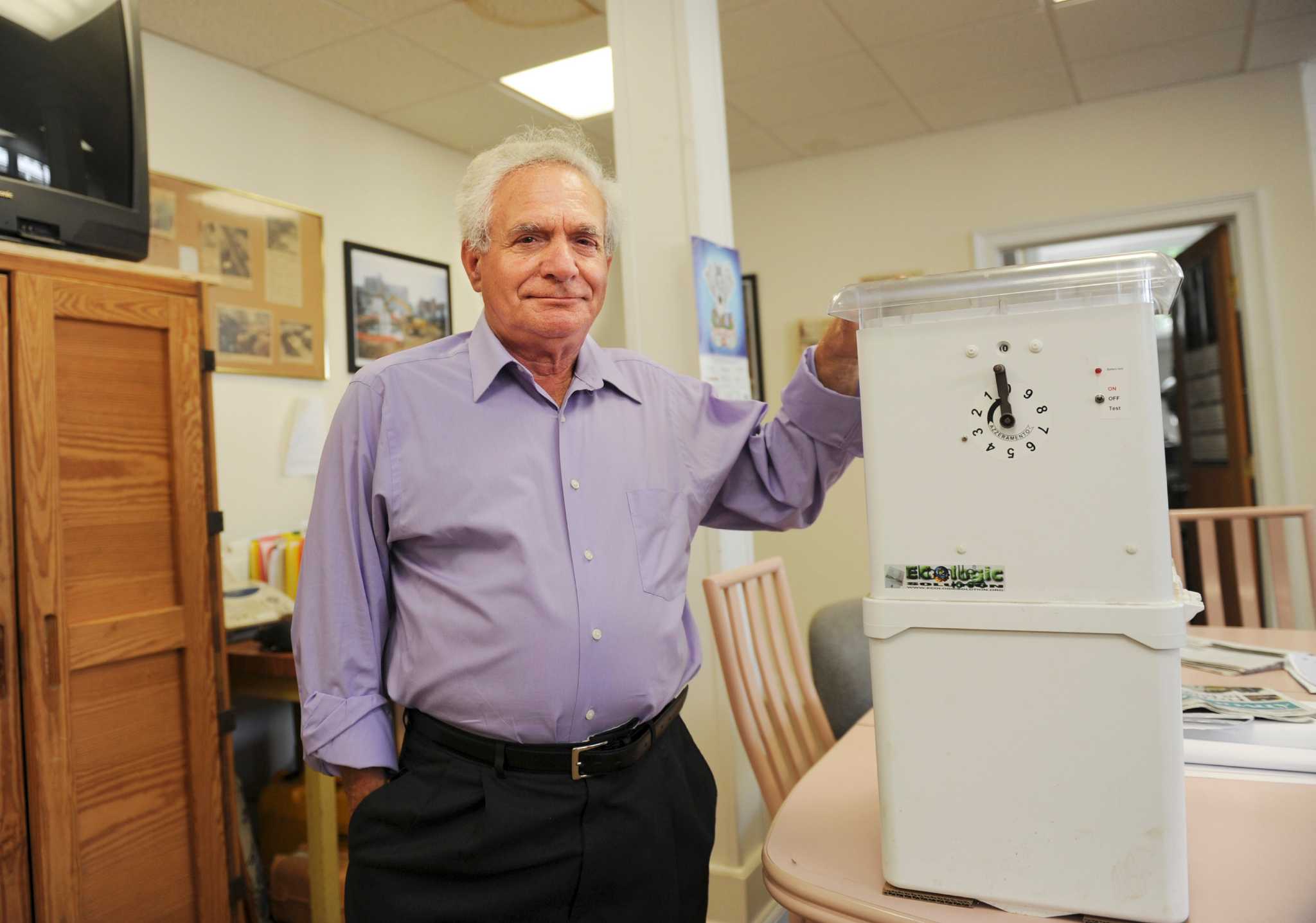 Rodent control expert exchanges his pipe for non-toxic box