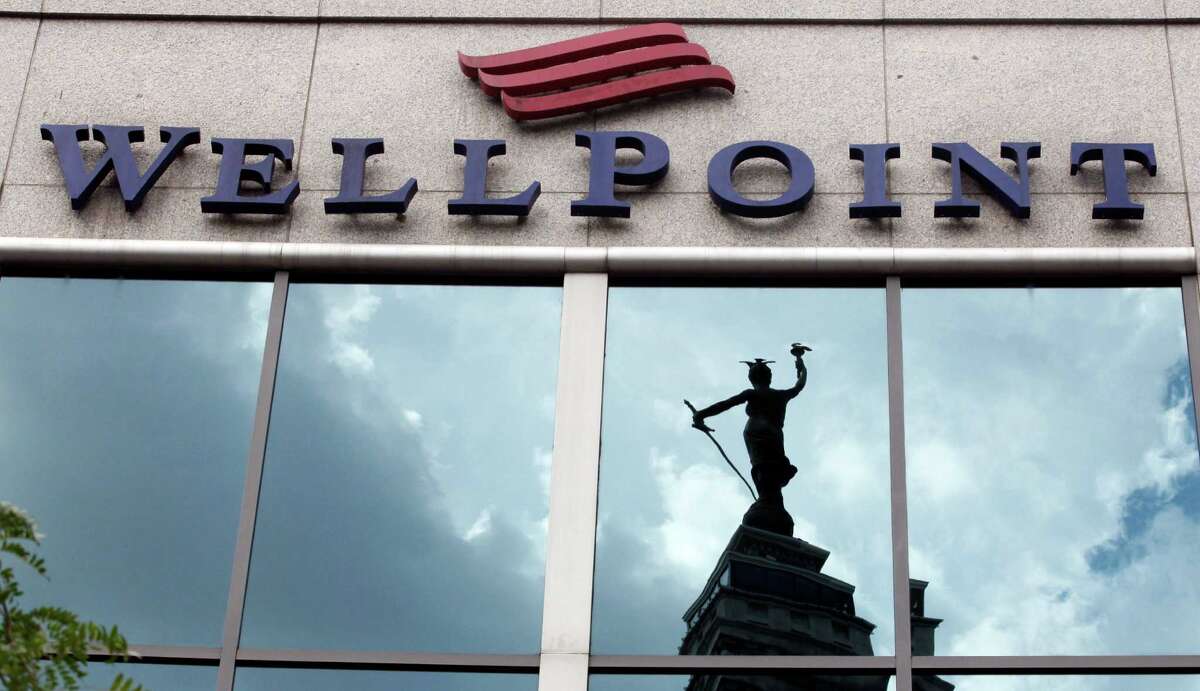 WellPoint lowers forecast after loss