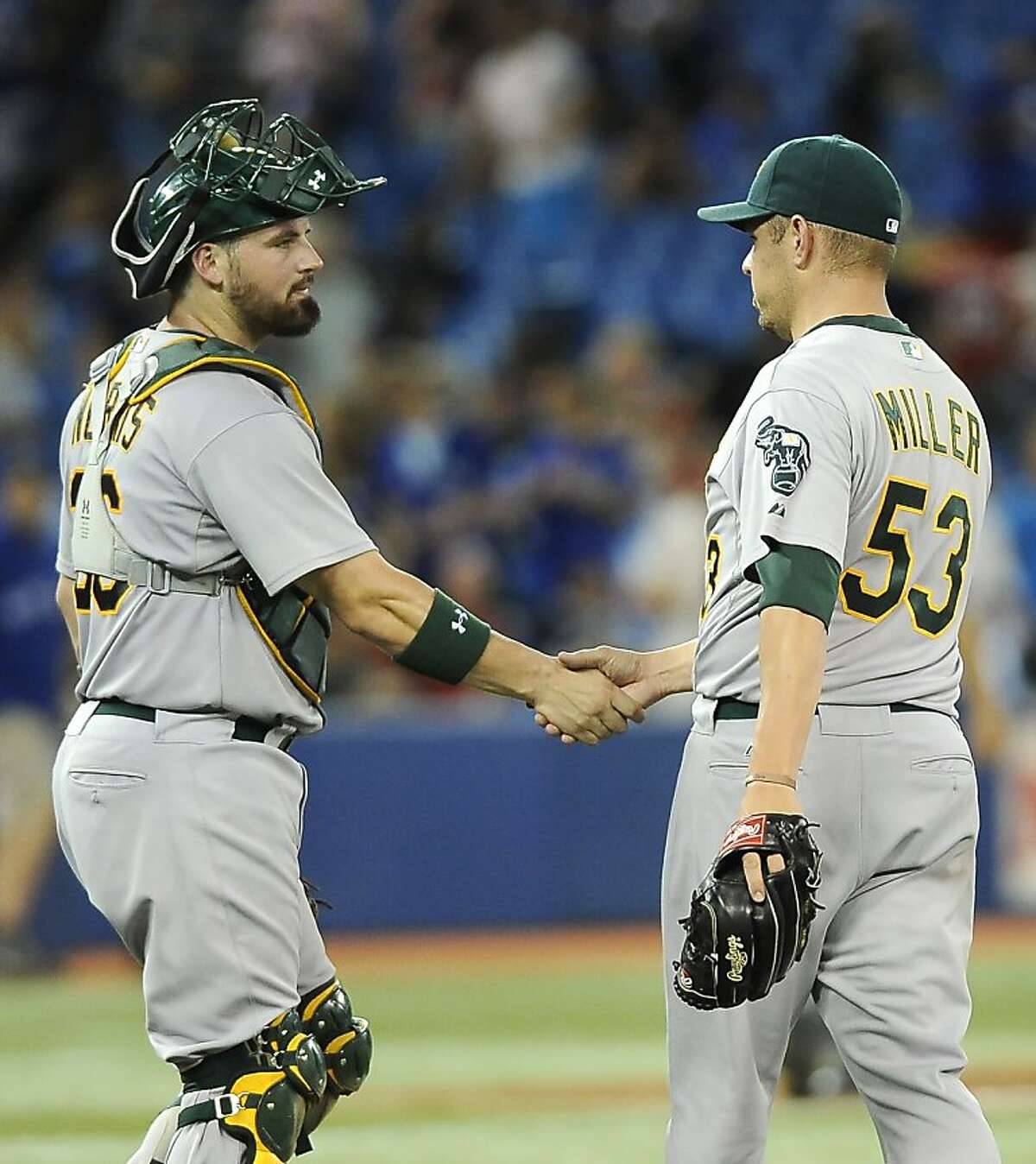 'Spiderman' Reddick helps A's toast Jays