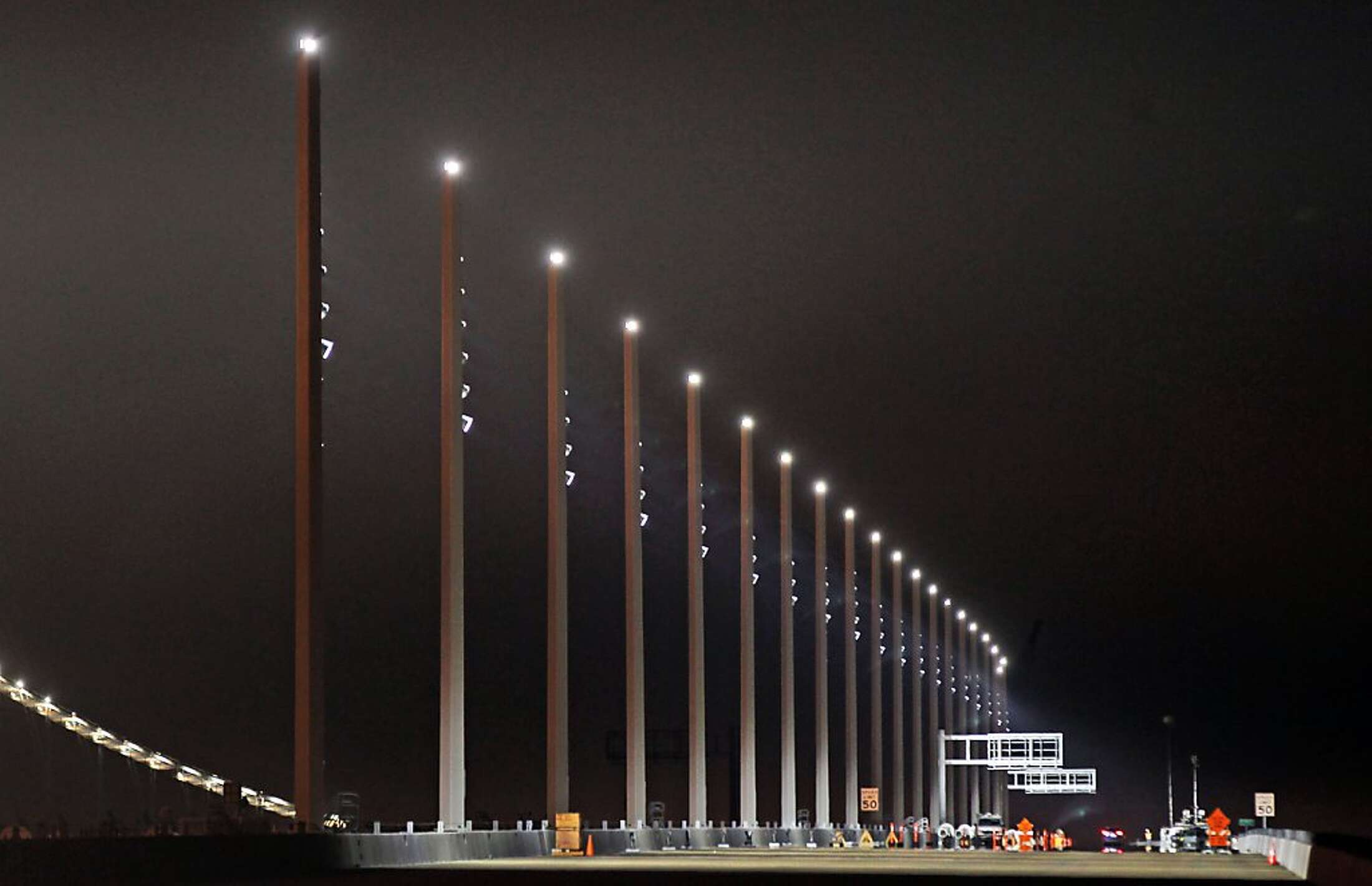 New lights march across span
