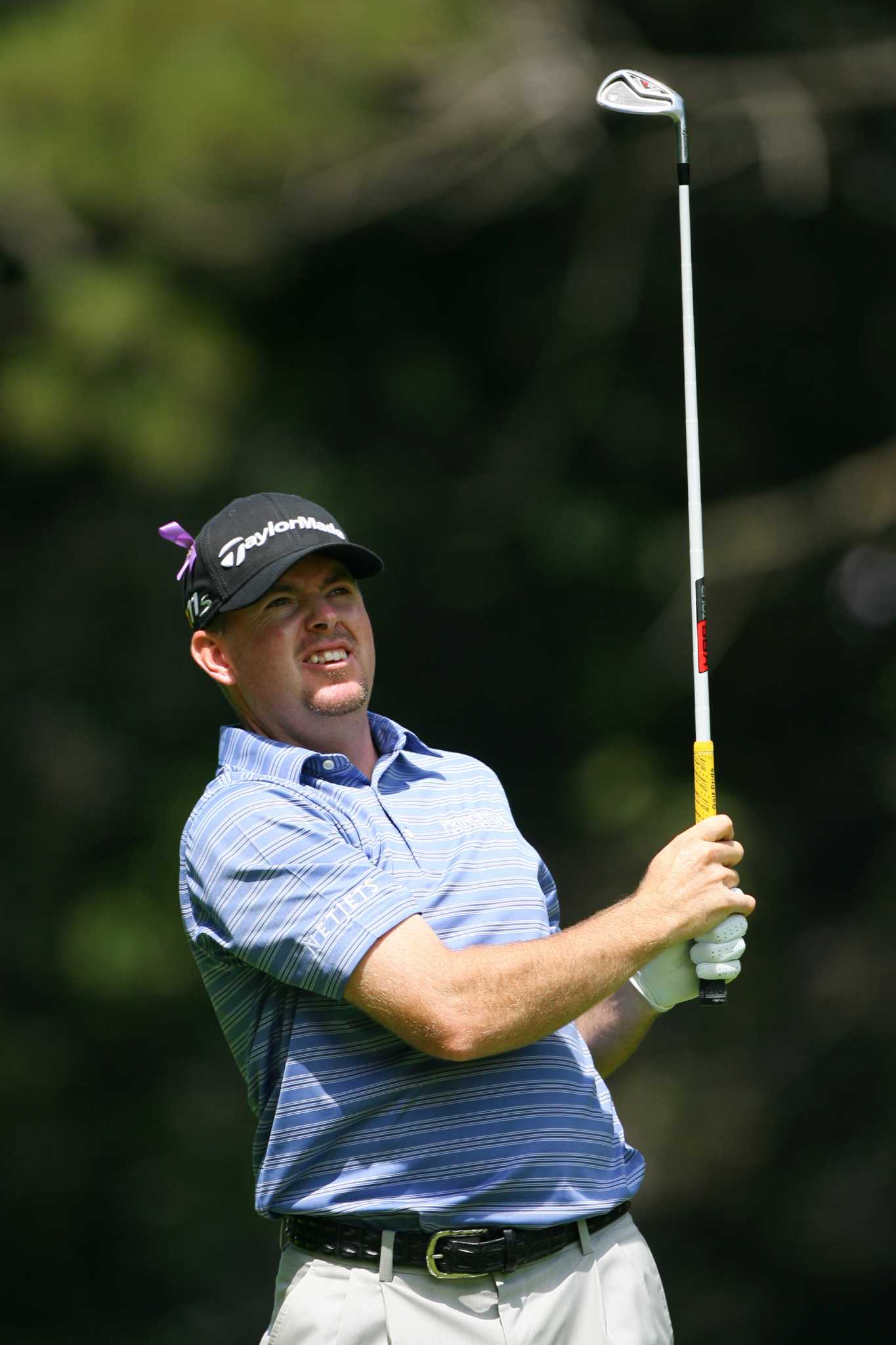 Garrigus climbs into lead