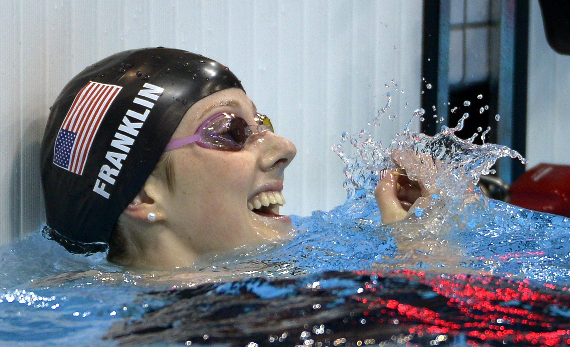 Swimming gold for Franklin, Grevers