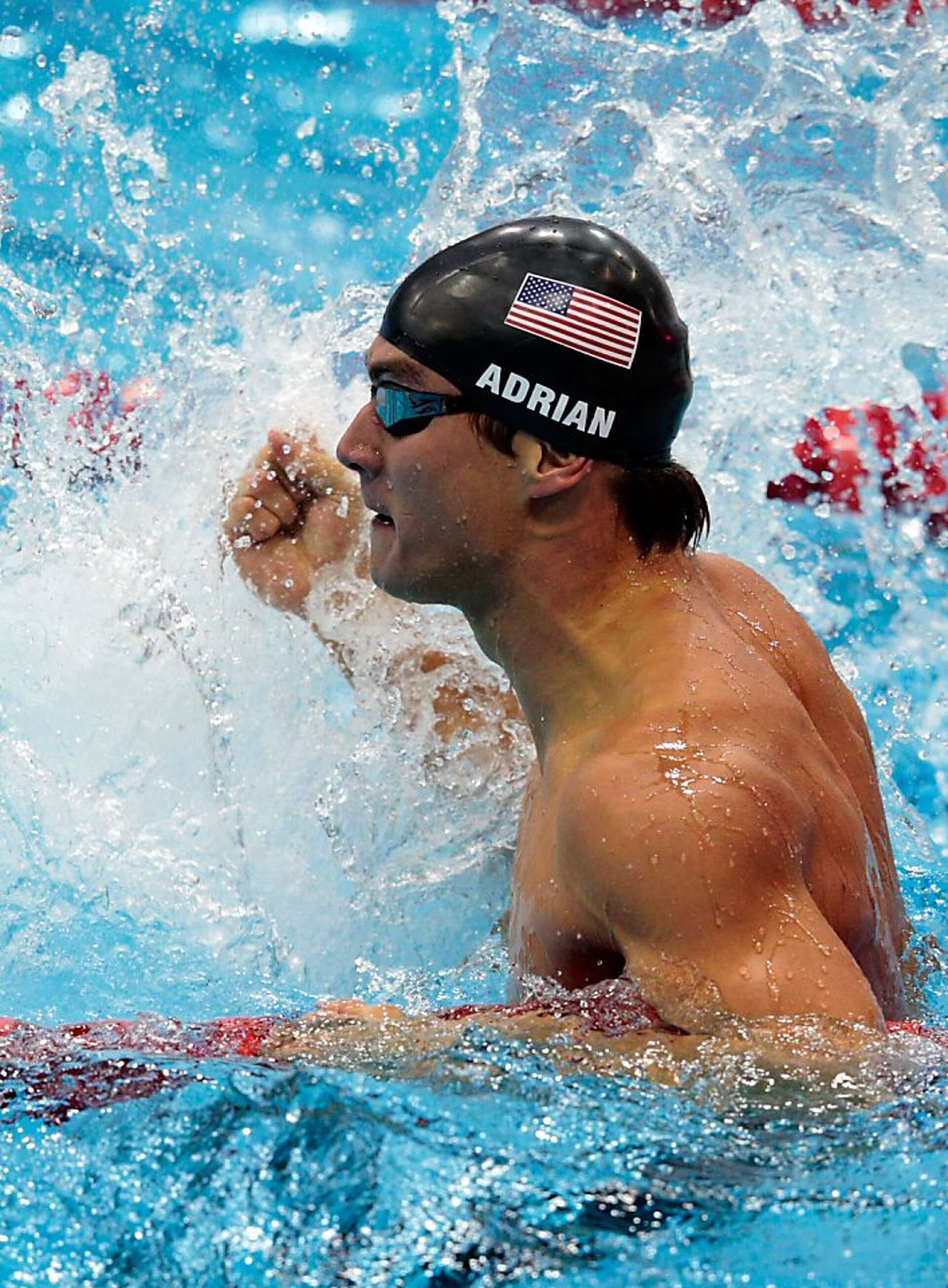 Cal alum Adrian wins 100-meter freestyle