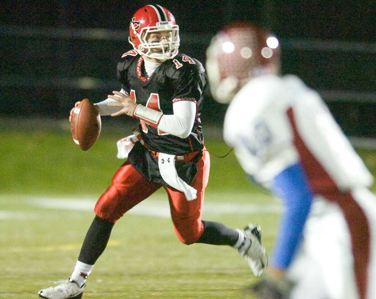 New Canaan football escapes with one-point win, reaches Class MM final