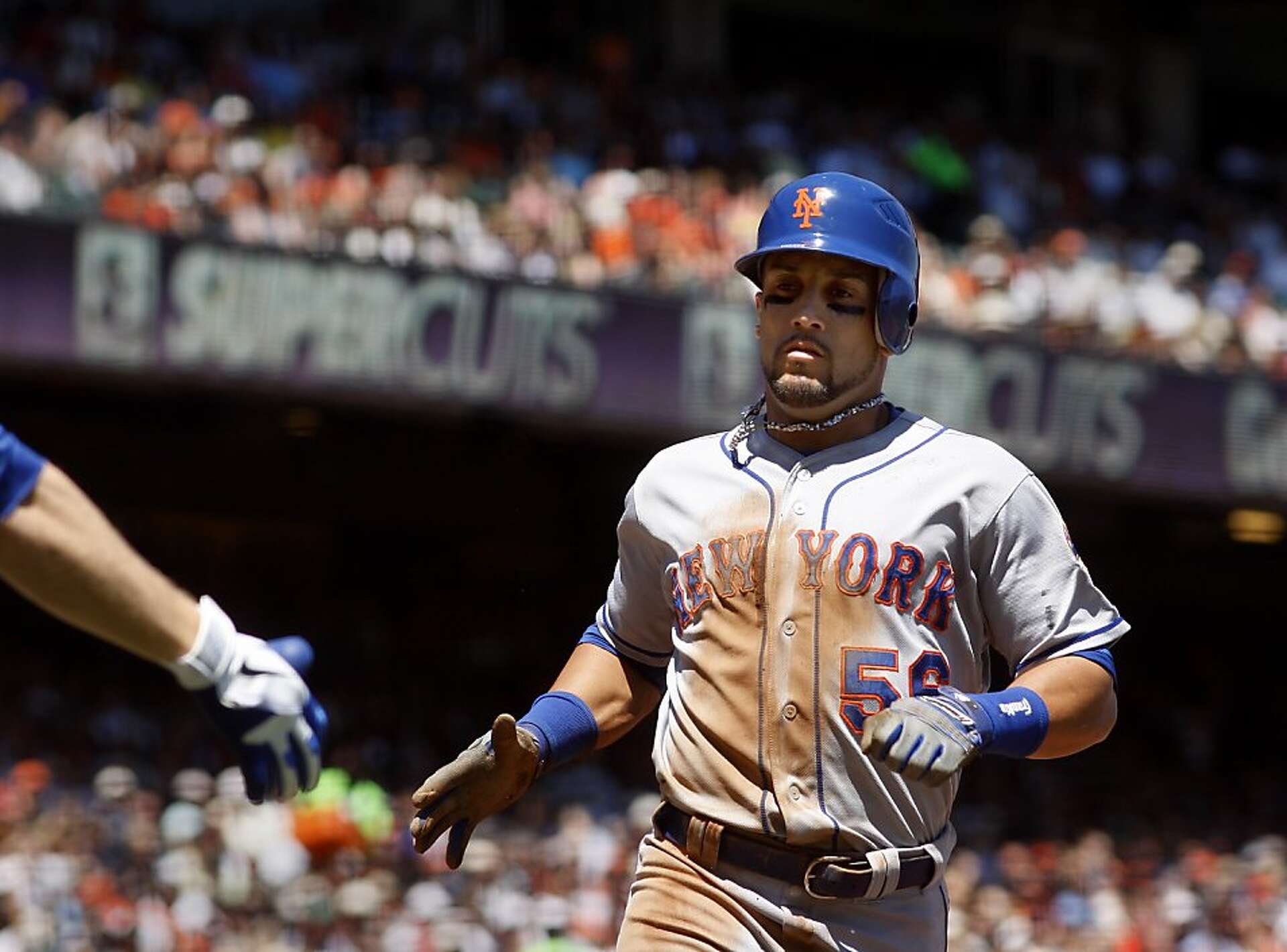 Torres pleased to be back with Giants