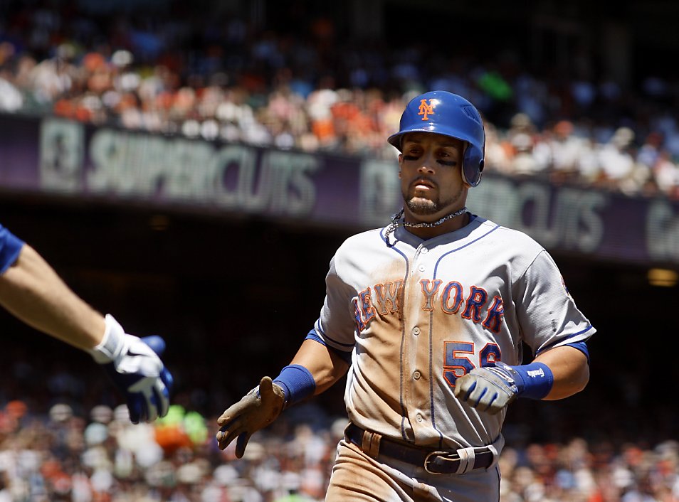 Torres pleased to be back with Giants