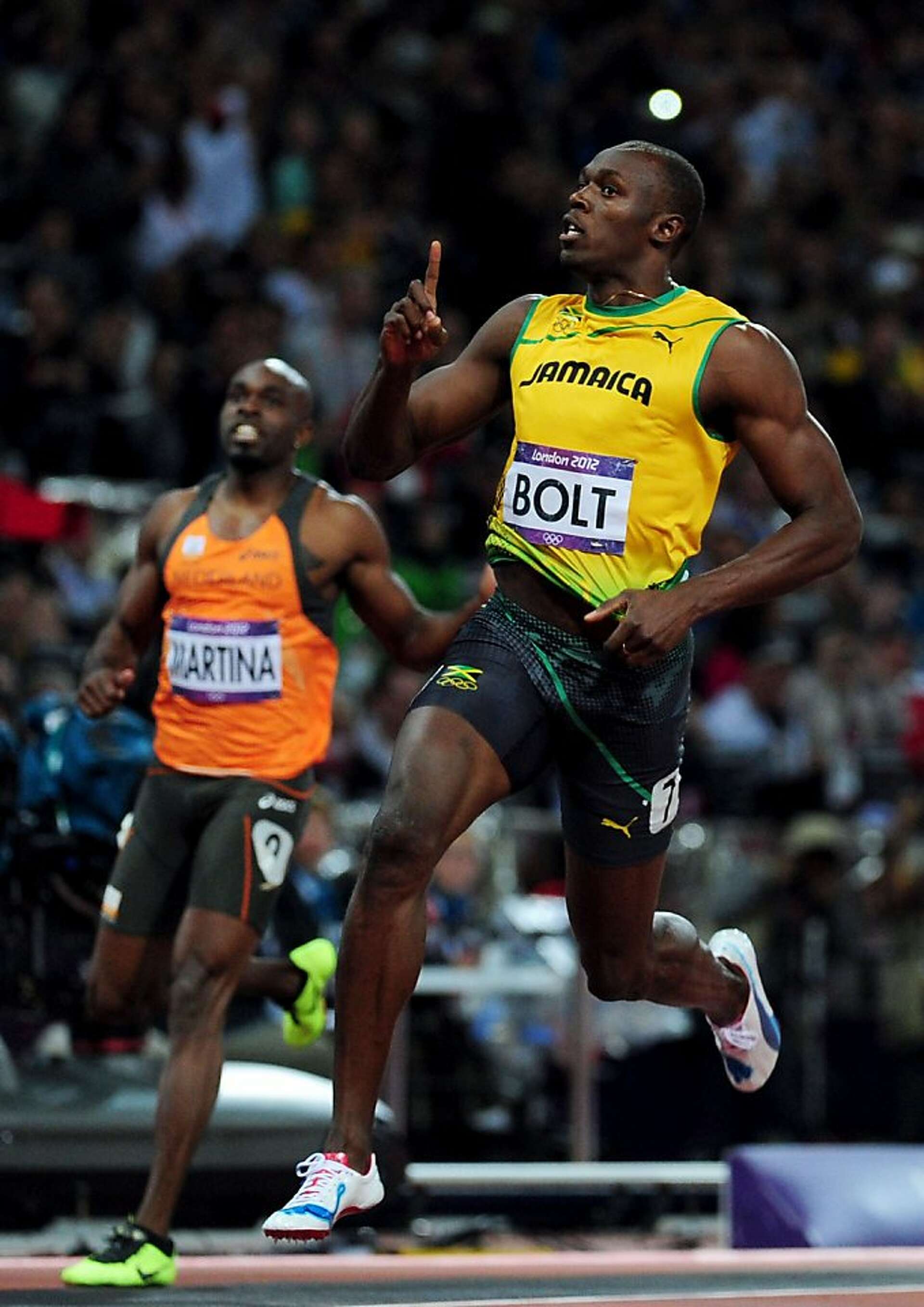 Richards-Ross gives U.S. 1st track gold