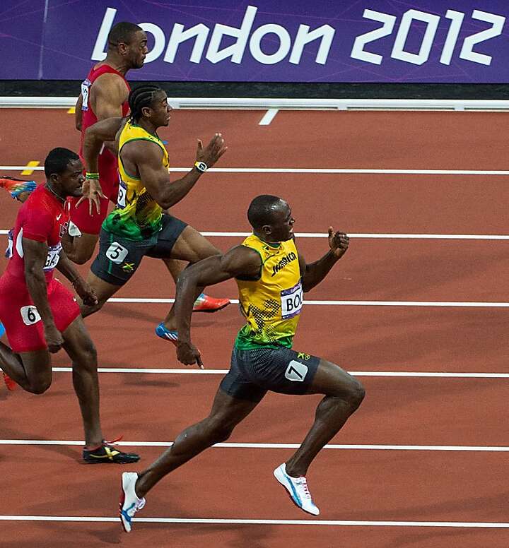 Richards-Ross gives U.S. 1st track gold