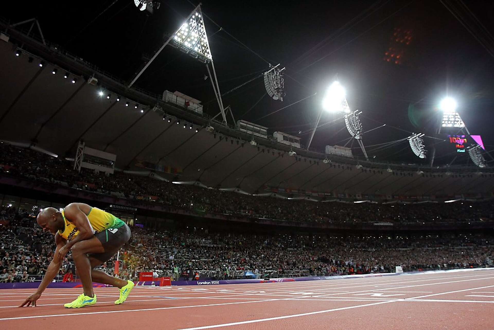 Richards-Ross gives U.S. 1st track gold