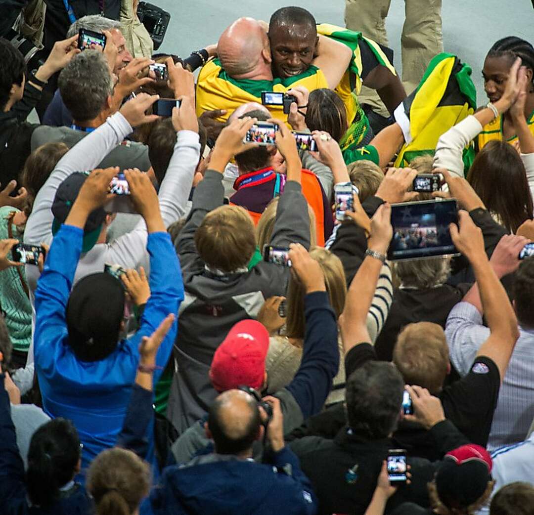 Richards-Ross gives U.S. 1st track gold