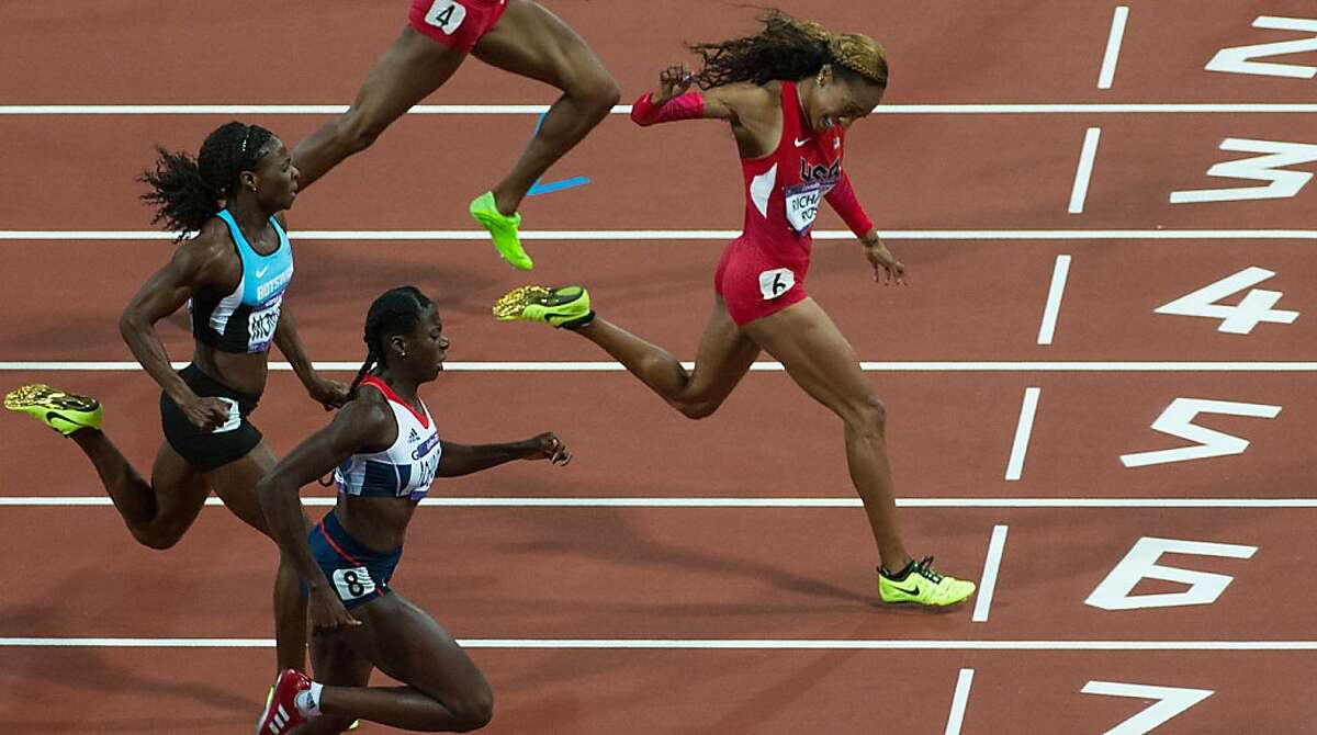 Richards-Ross gives U.S. 1st track gold