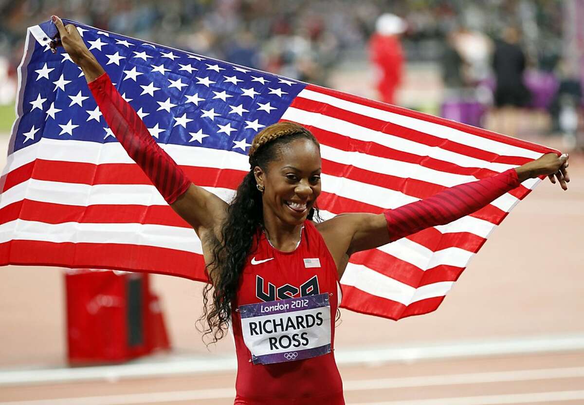 Richards-Ross gives U.S. 1st track gold