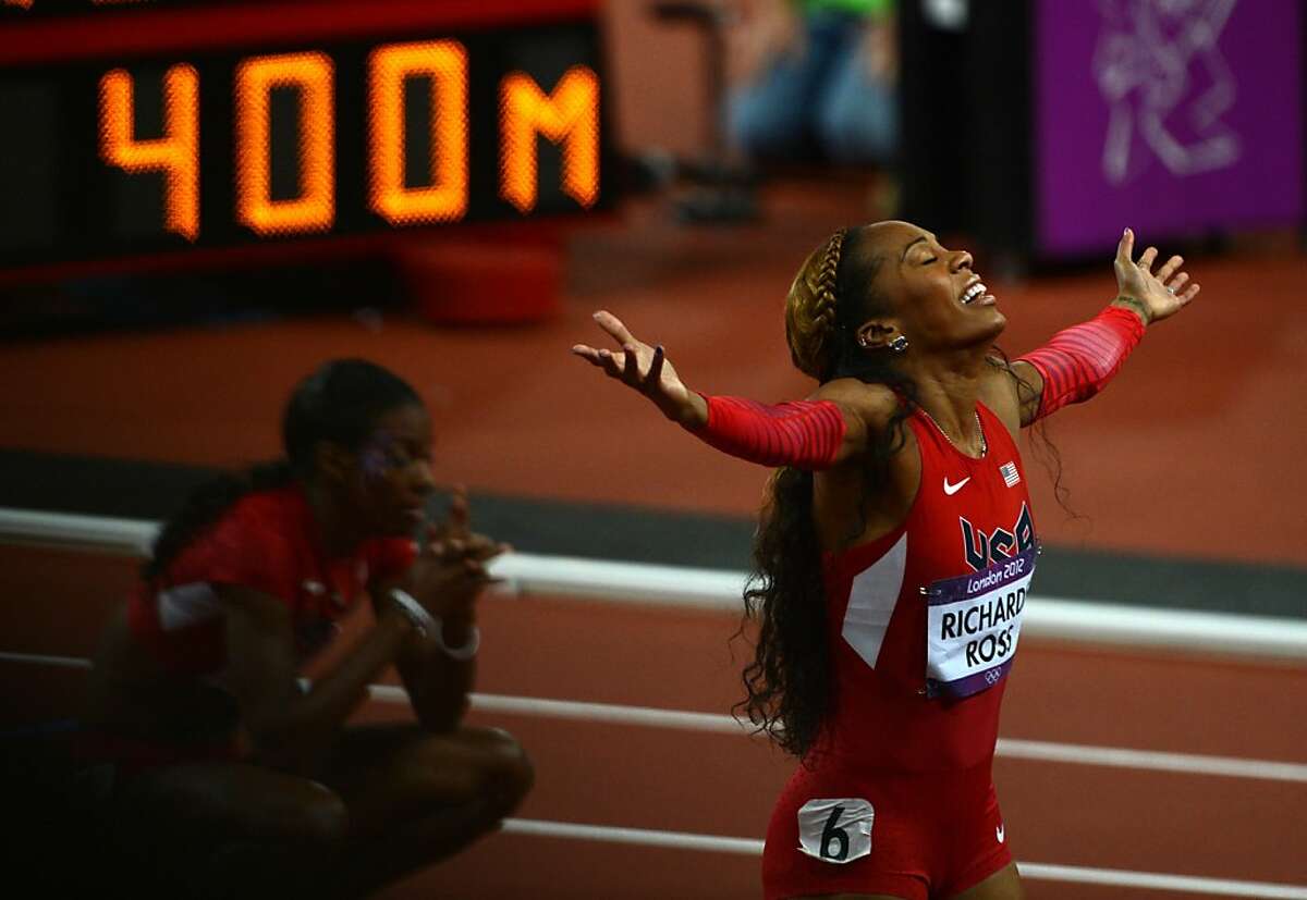 Richards-Ross gives U.S. 1st track gold