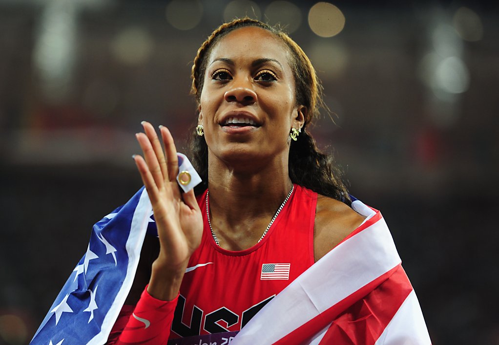 Richards-Ross gives U.S. 1st track gold