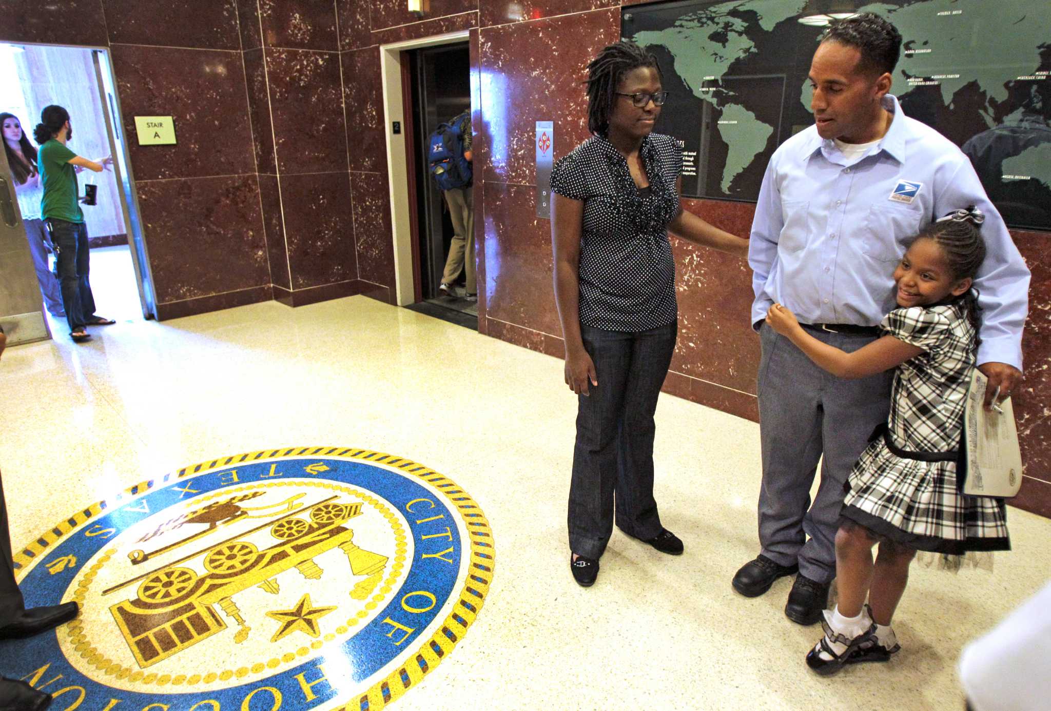 Mailman honored for saving two children from burning home