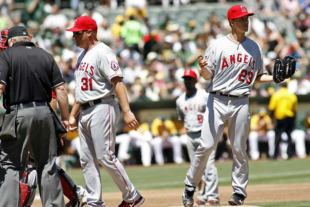 5-run rally carries A's past Angels 9-8