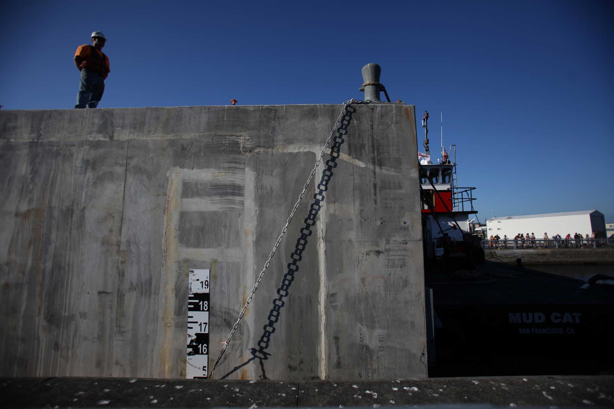 520 floating bridge pontoon passes through Ballard Locks