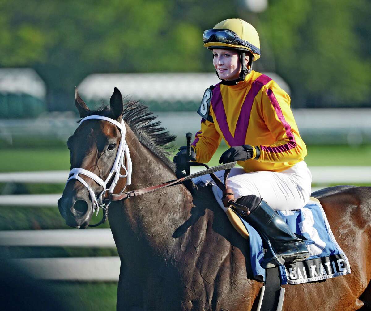 Kauai Katie riding the wave