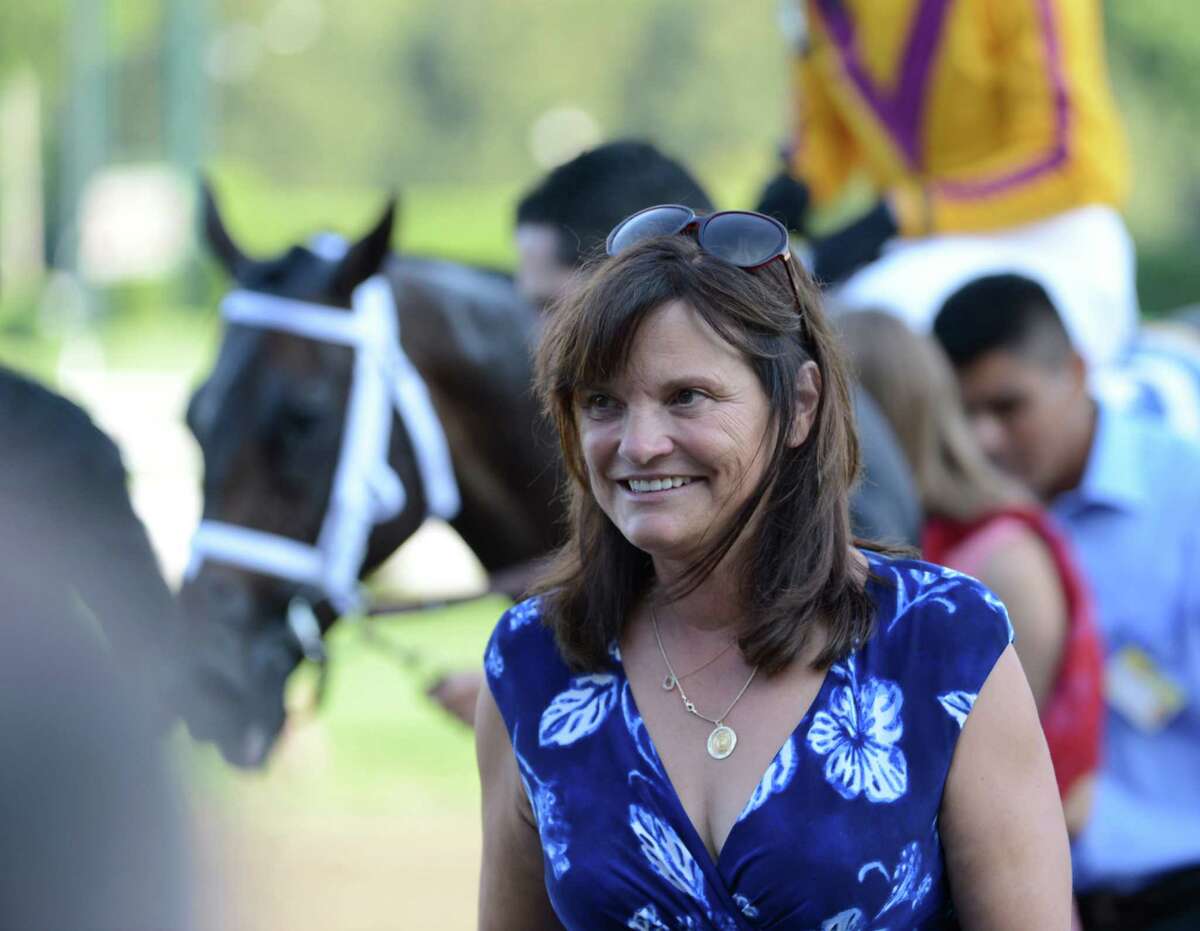 Kauai Katie riding the wave